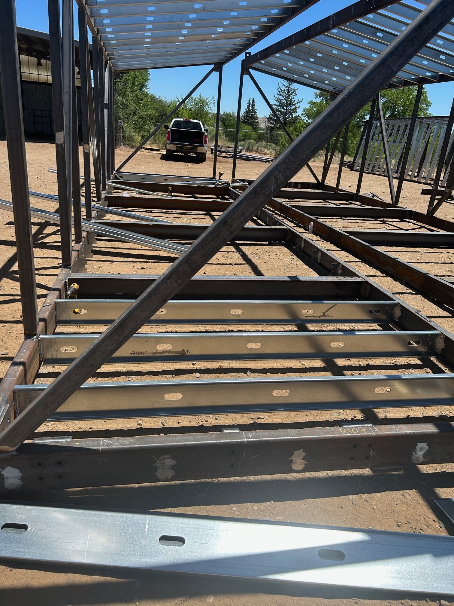 STEEL STRUCTURES OF MODULES START FABRICATION - Yardstick Studio, LLC